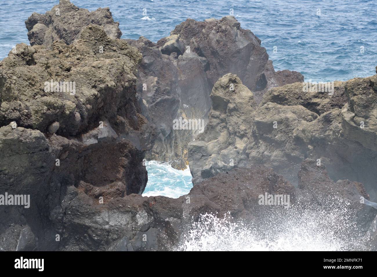 Volcanic rock cliffs eroded by the sea in Lanzarote Stock Photo - Alamy