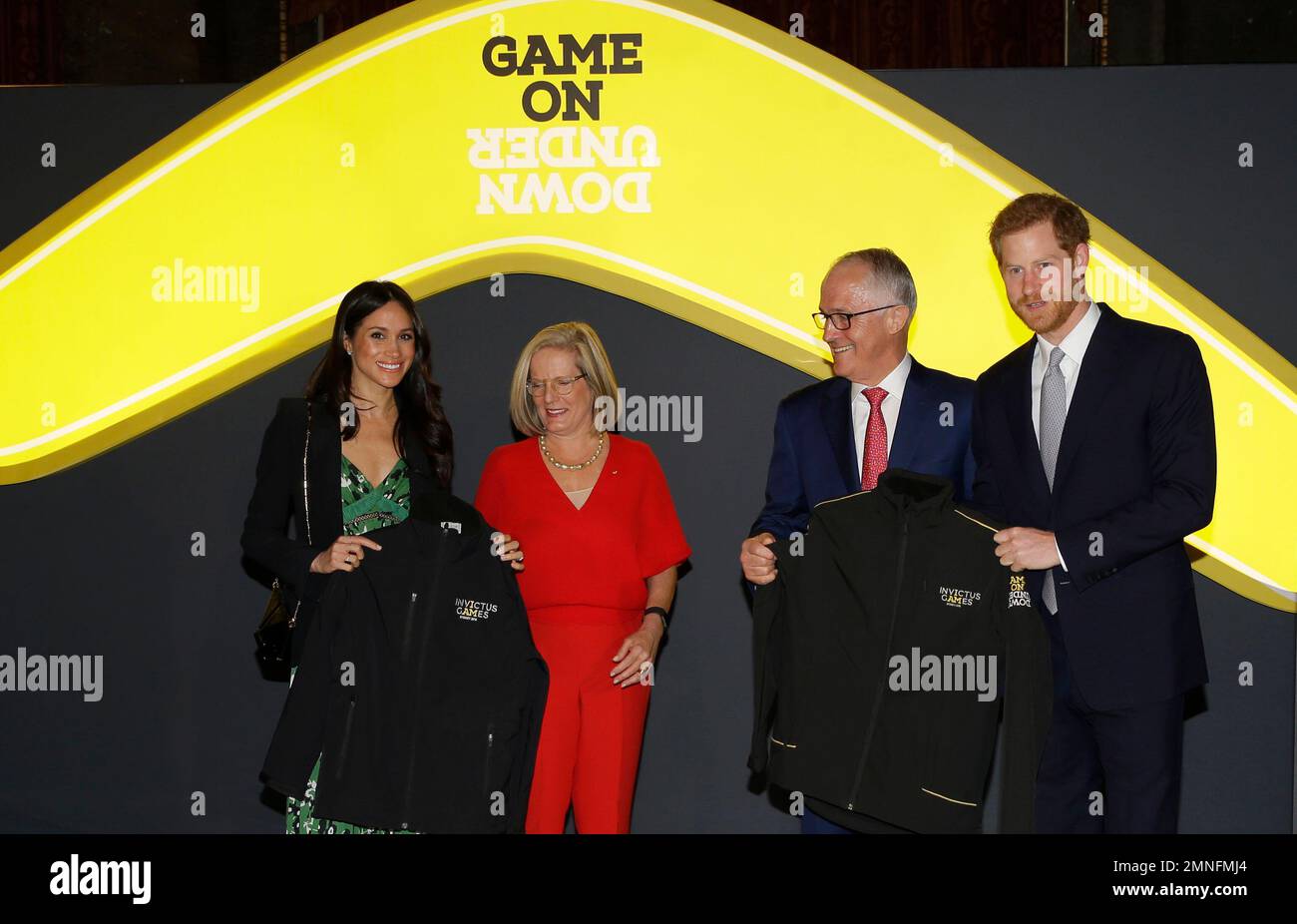 Britain's Prince Harry and Meghan Markle receive Invictus Games jackets ...