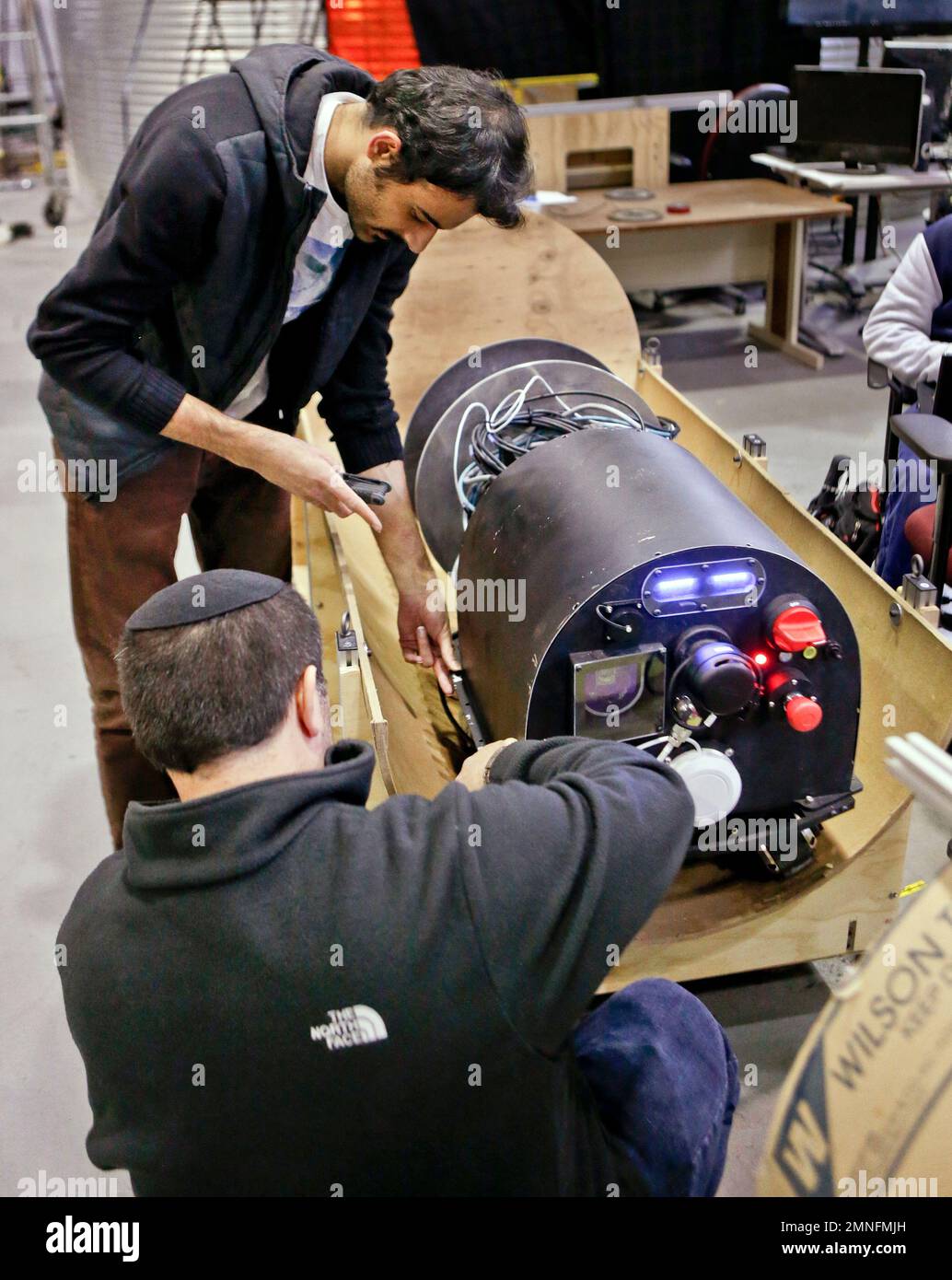 In this photo made on Wednesday, April 4, 2018, Mohammad Mousaei, top ...