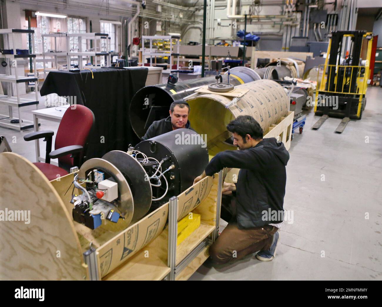 In this photo made on Wednesday, April 4, 2018, David Kohandash, left ...