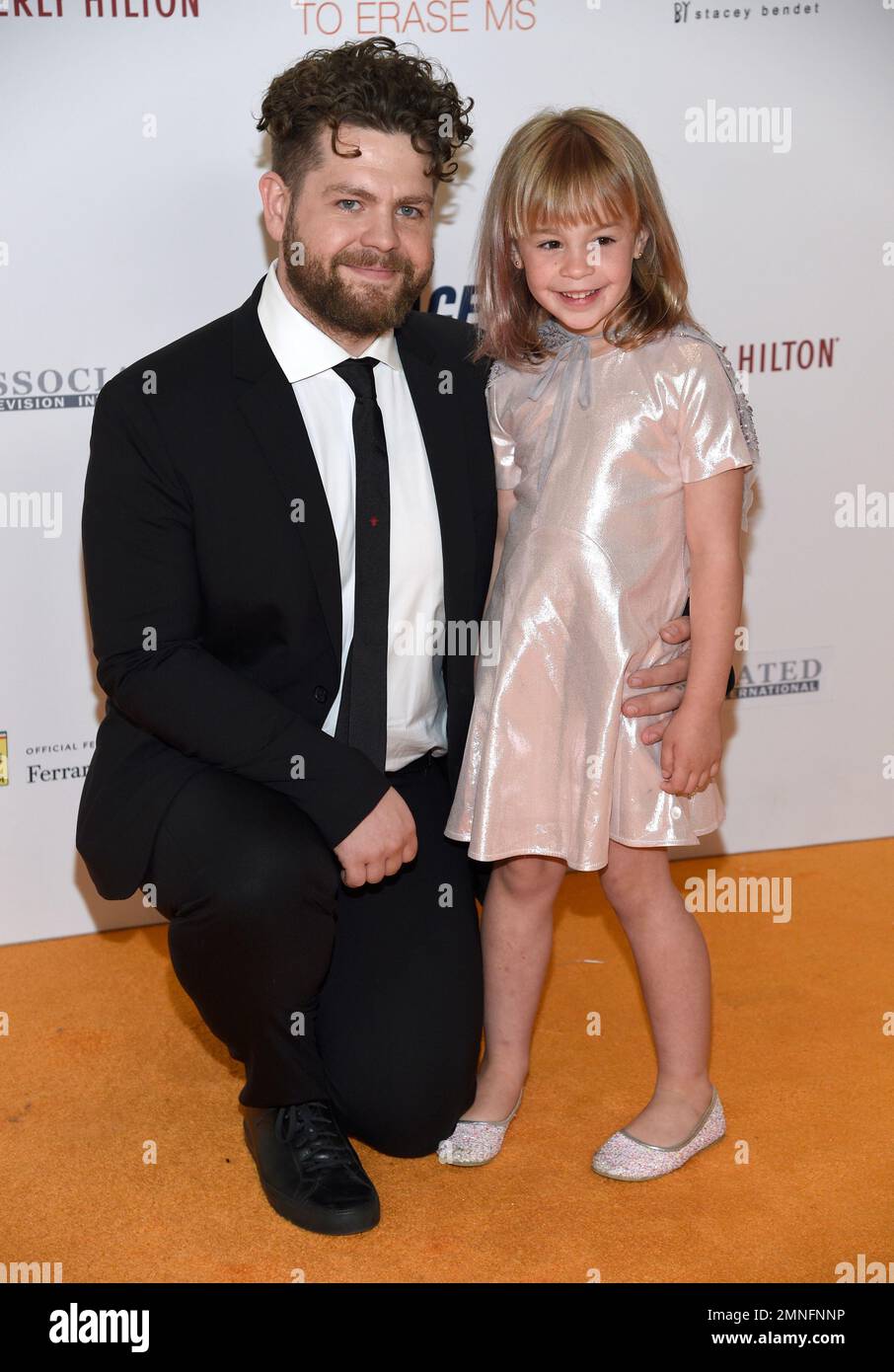 Jack Osbourne, left, and his daughter Pearl arrive at the 25th annual ...