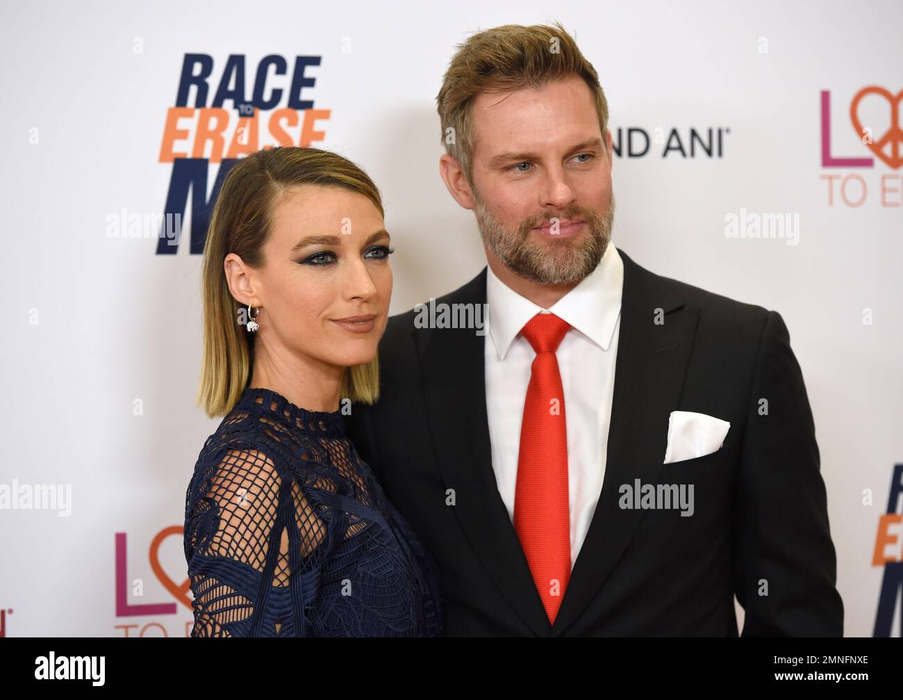 Natalie Zea, left, and Travis Schuldt arrive at the 25th annual Race to ...