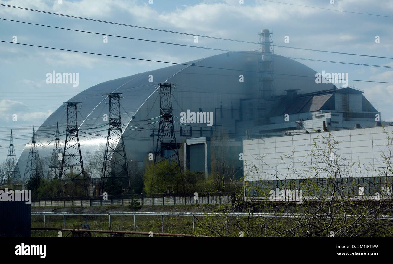 A new shelter is installed over the exploded reactor at the Chernobyl ...