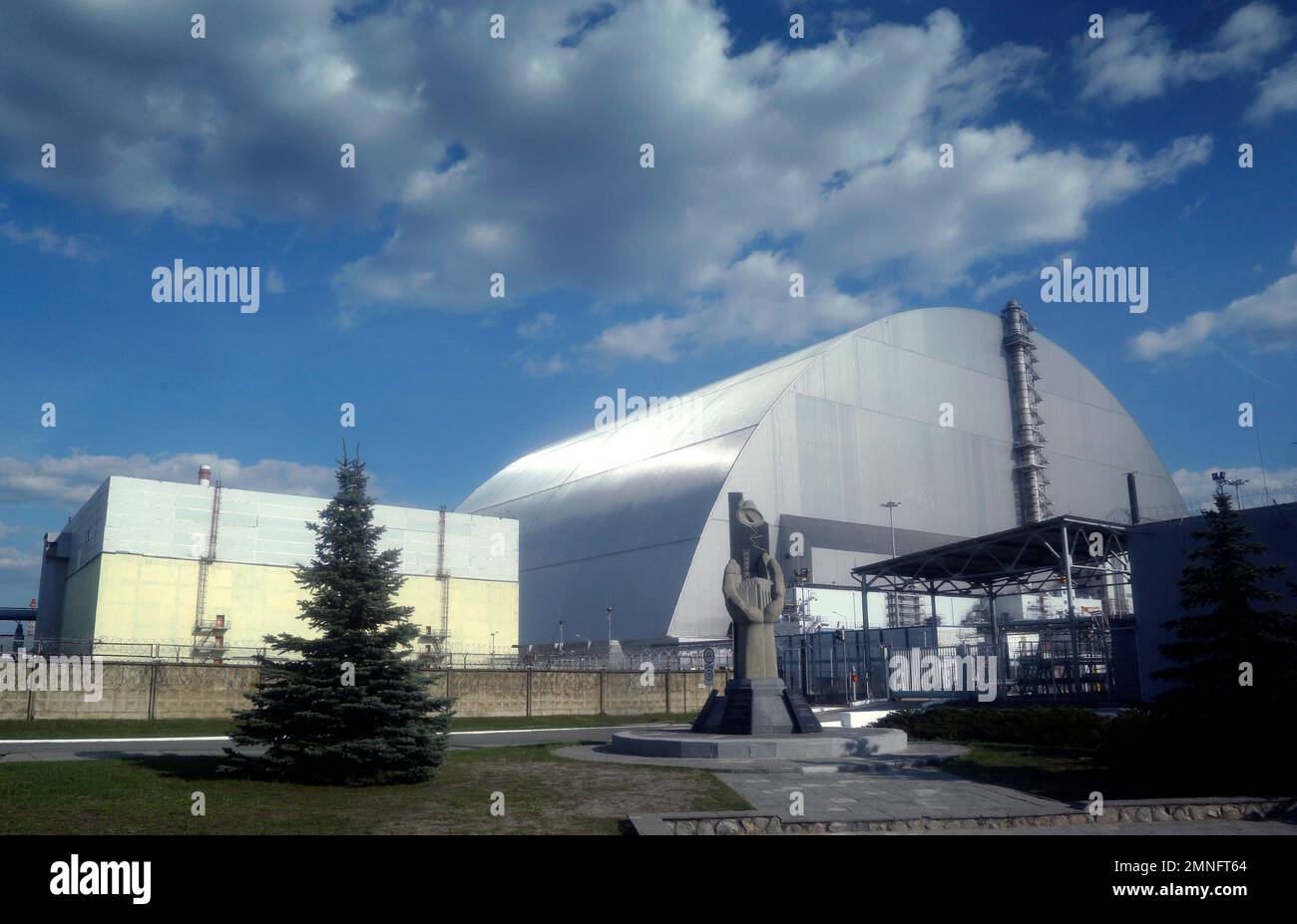 A new shelter is installed over the exploded reactor at the Chernobyl ...