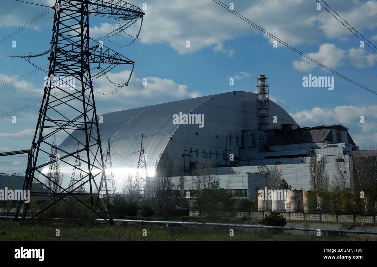 A new shelter is installed over the exploded reactor at the Chernobyl ...