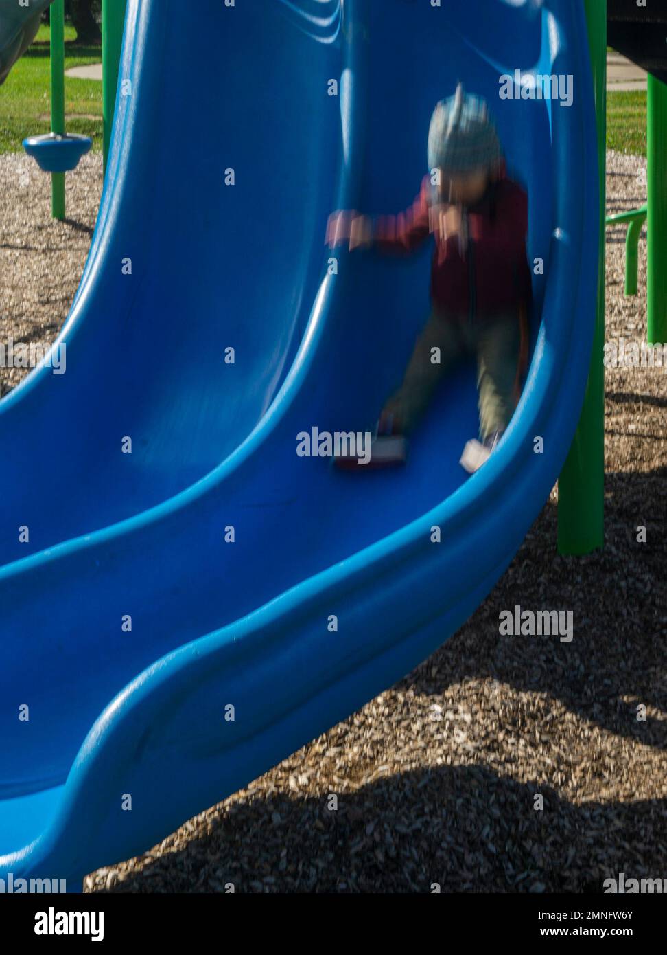 Toronto, Ontario, Canada , October 2017 - Little child on a slide at a ...