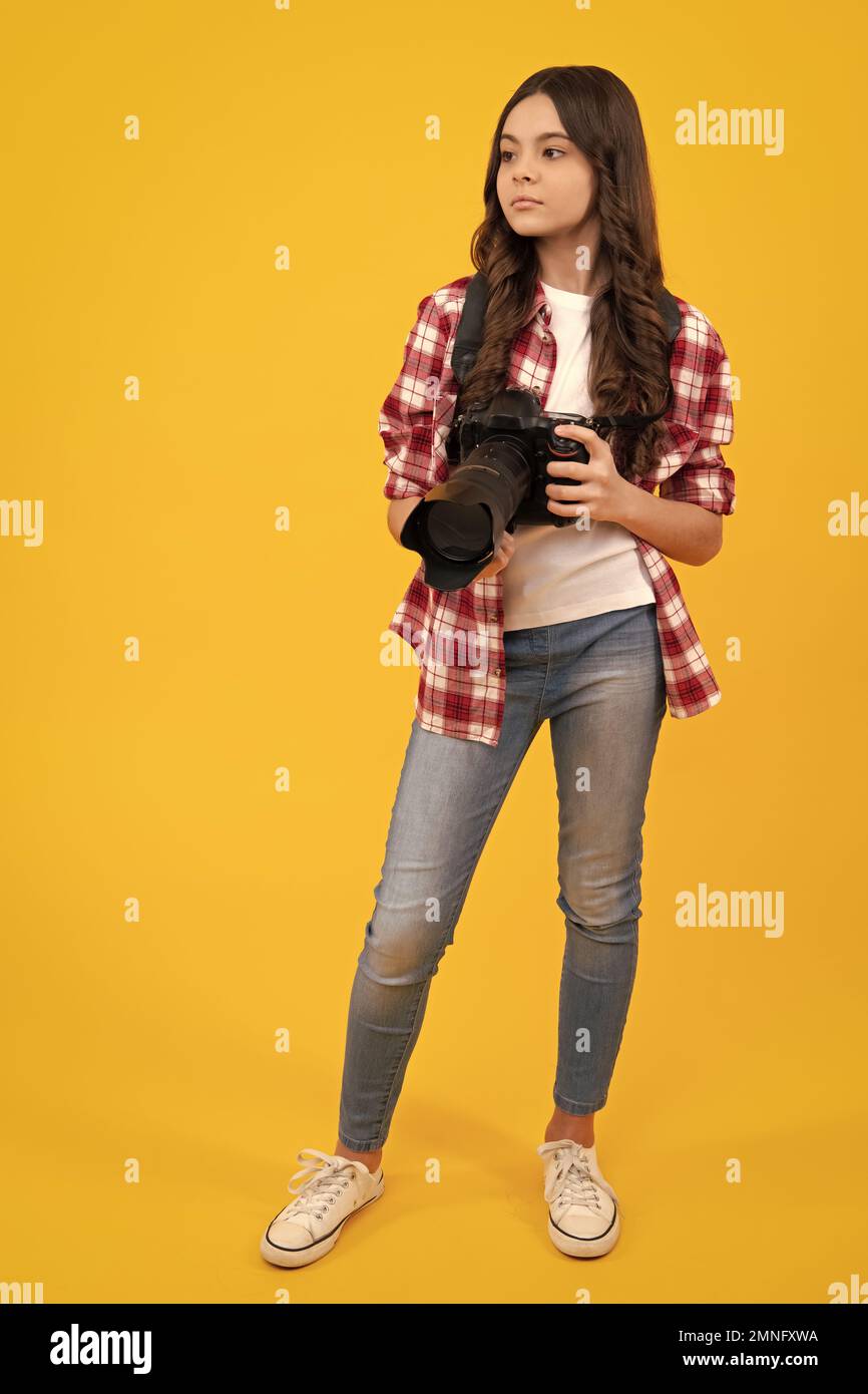 Teen girl with photo camera, young talented photographer. Photo ...