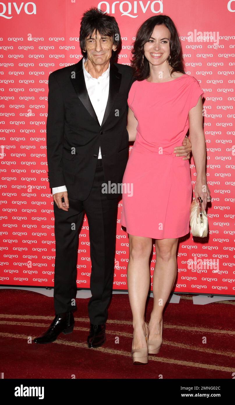 London. UK. Ronnie Wood and Sally Humphreys at the Arqiva Commercial ...