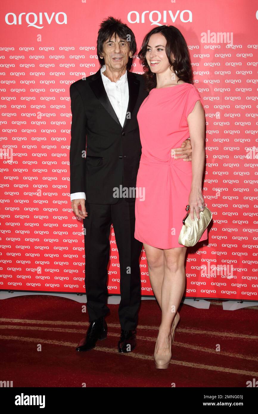 London. UK. Ronnie Wood and Sally Humphreys at the Arqiva Commercial ...