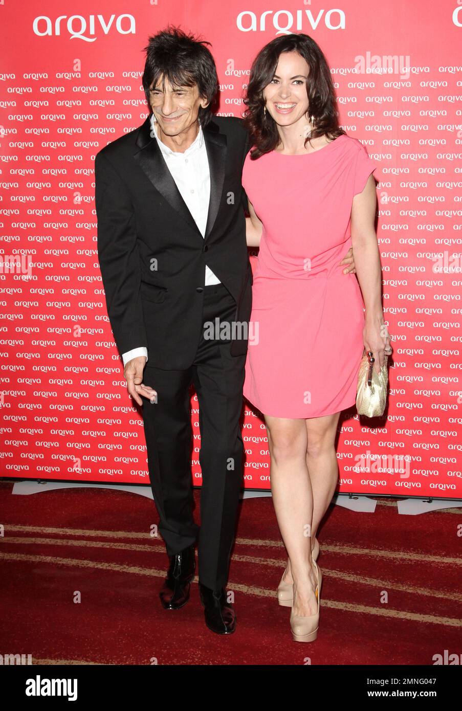 London. UK. Ronnie Wood and Sally Humphreys at the Arqiva Commercial ...
