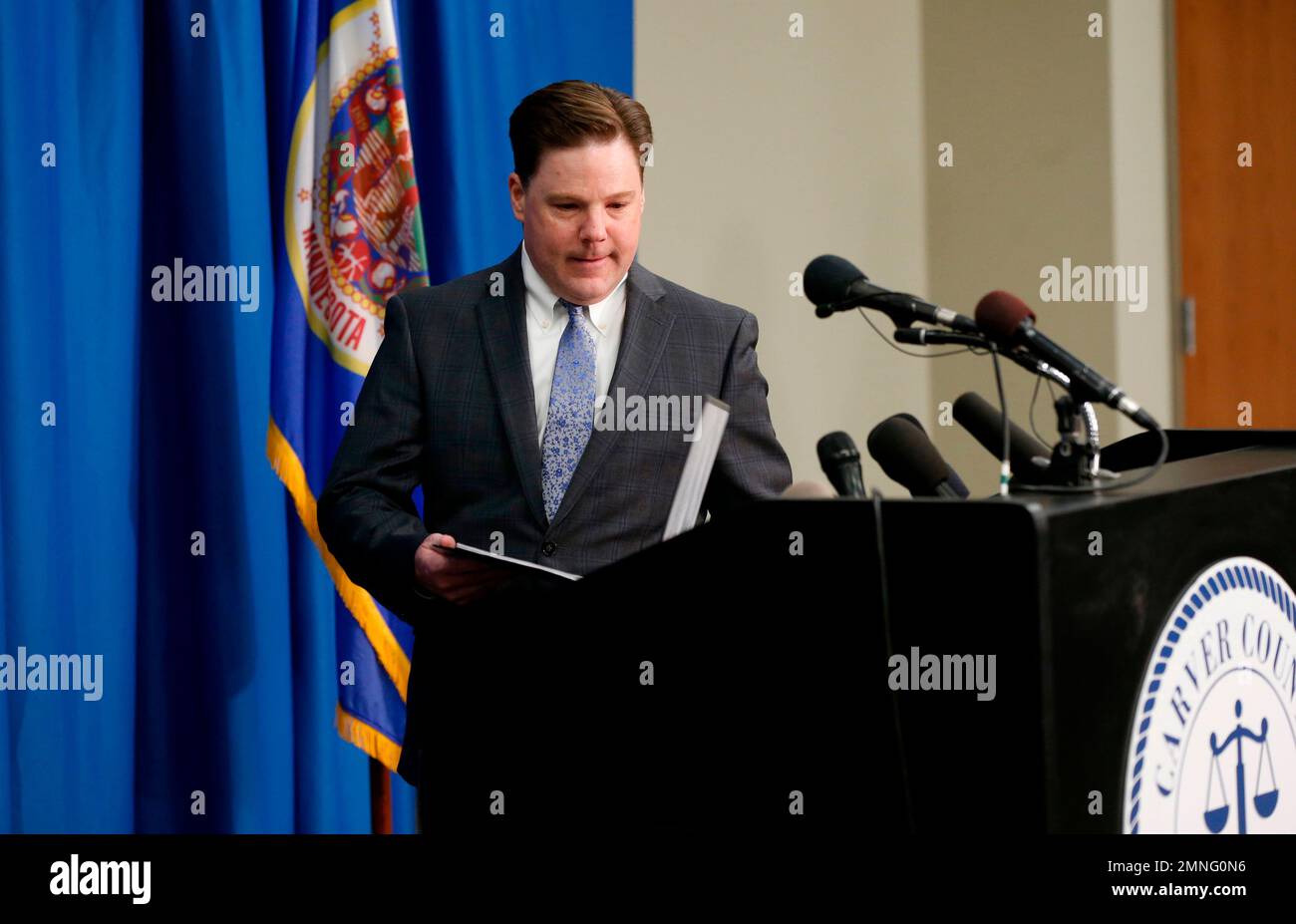 Carver County Attorney Mark Metz arrives at the podium to announce that ...