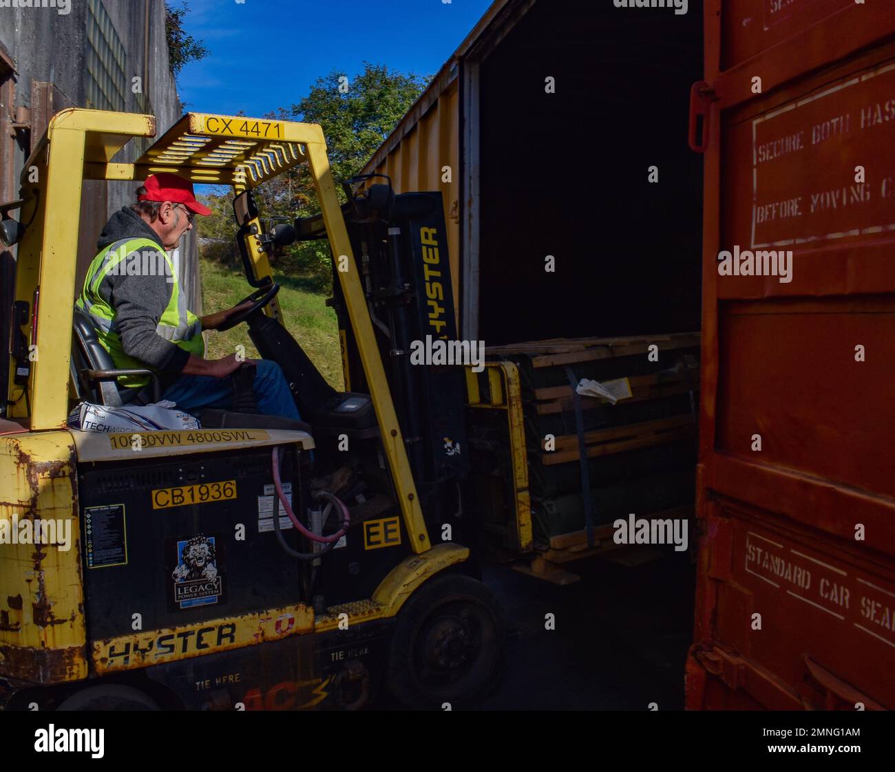 Explosive handlers at Crane Army Ammunition Activity load a railcar for ...