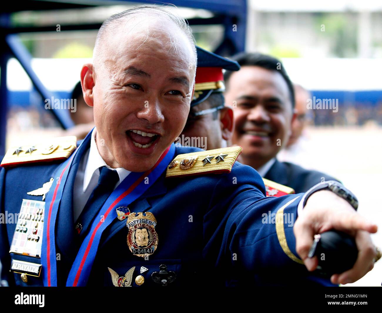 Incoming police chief General Oscar Albayalde points to the media ...