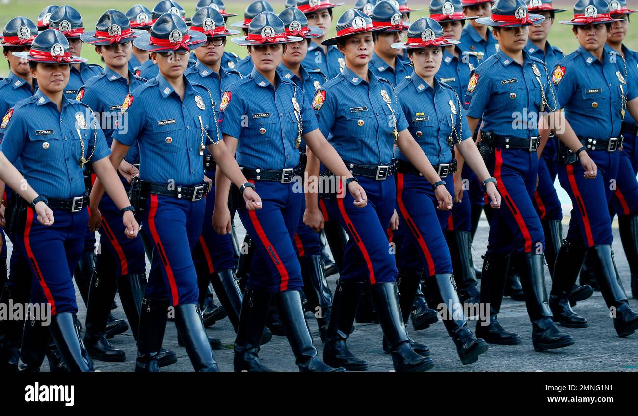Female members of the Philippine National Police (PNP) march during the ...