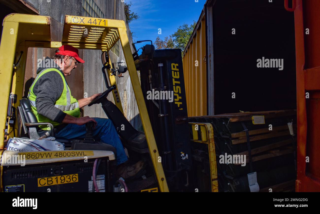 Explosive handlers at Crane Army Ammunition Activity load a railcar for ...