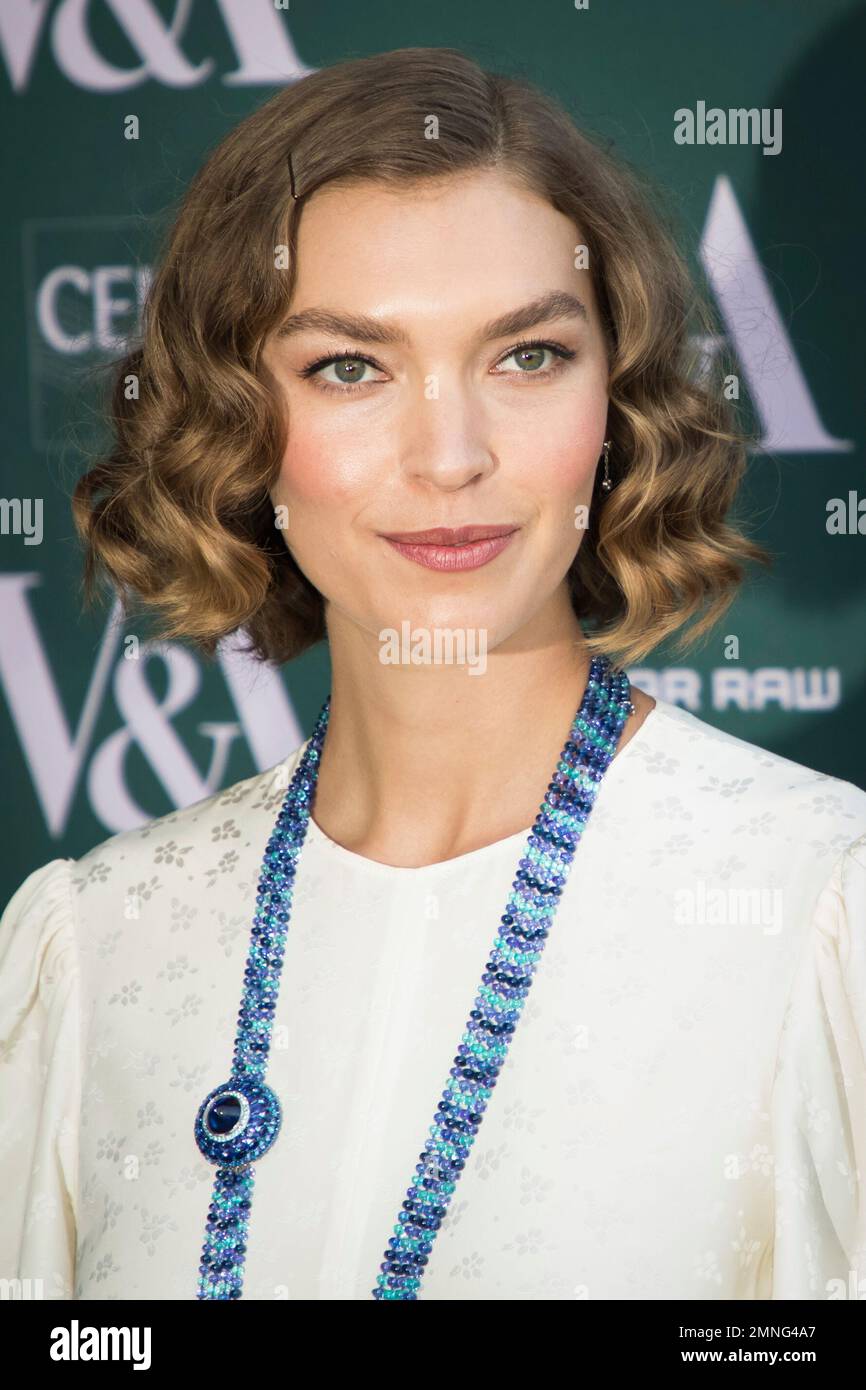 Model Arizona Muse poses for photographers upon arrival at the preview ...