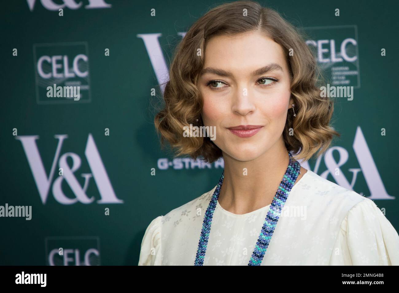 Model Arizona Muse poses for photographers upon arrival at the preview ...