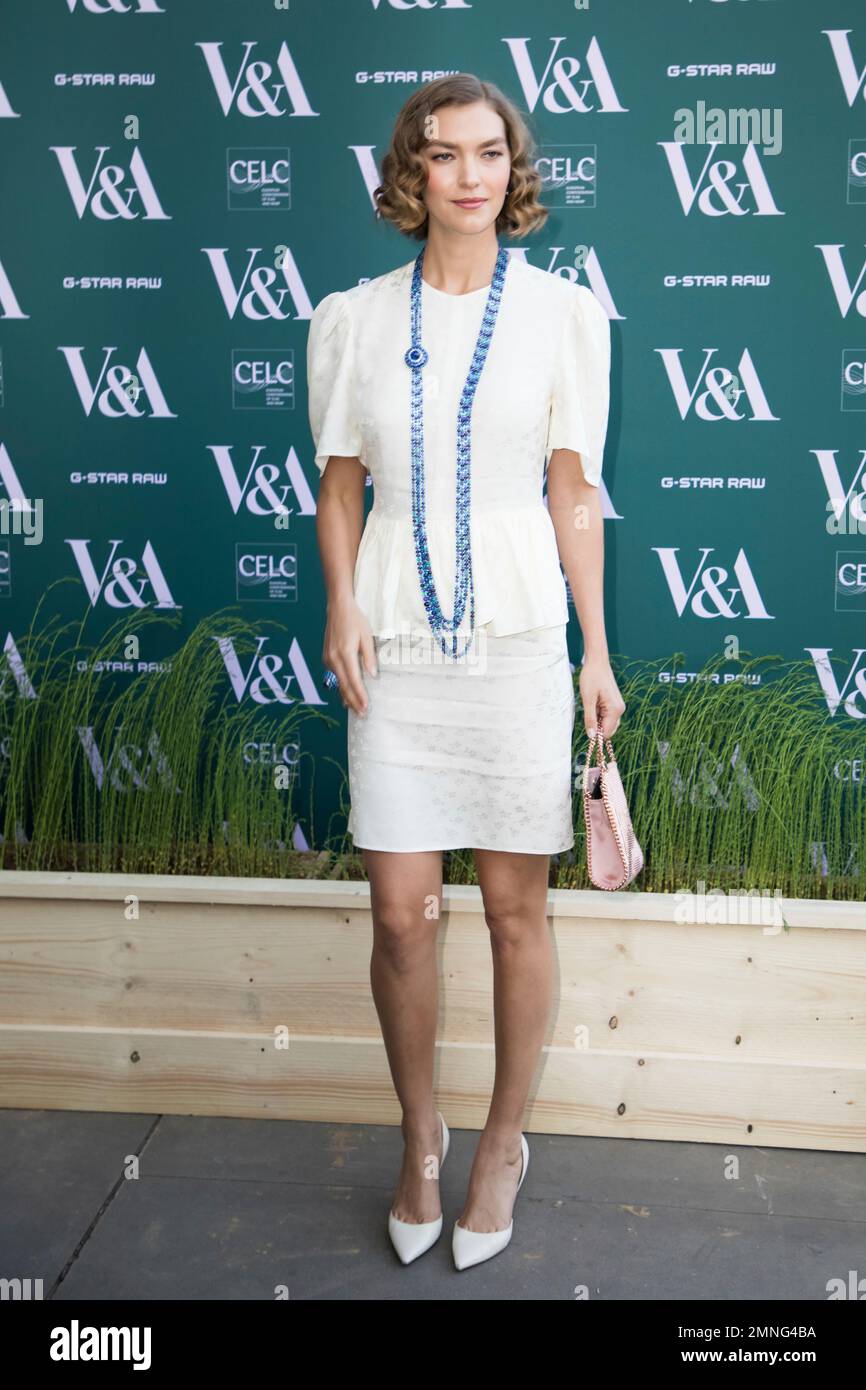 Model Arizona Muse poses for photographers upon arrival at the preview ...