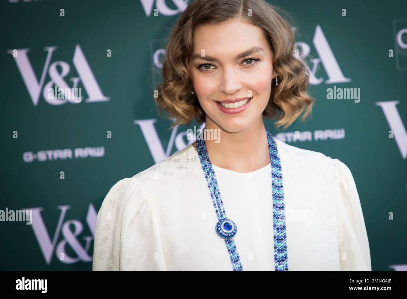 Model Arizona Muse poses for photographers upon arrival at the preview ...