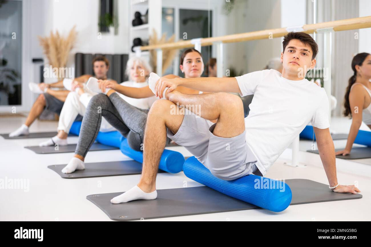 People doing different exercises gym hi-res stock photography and ...