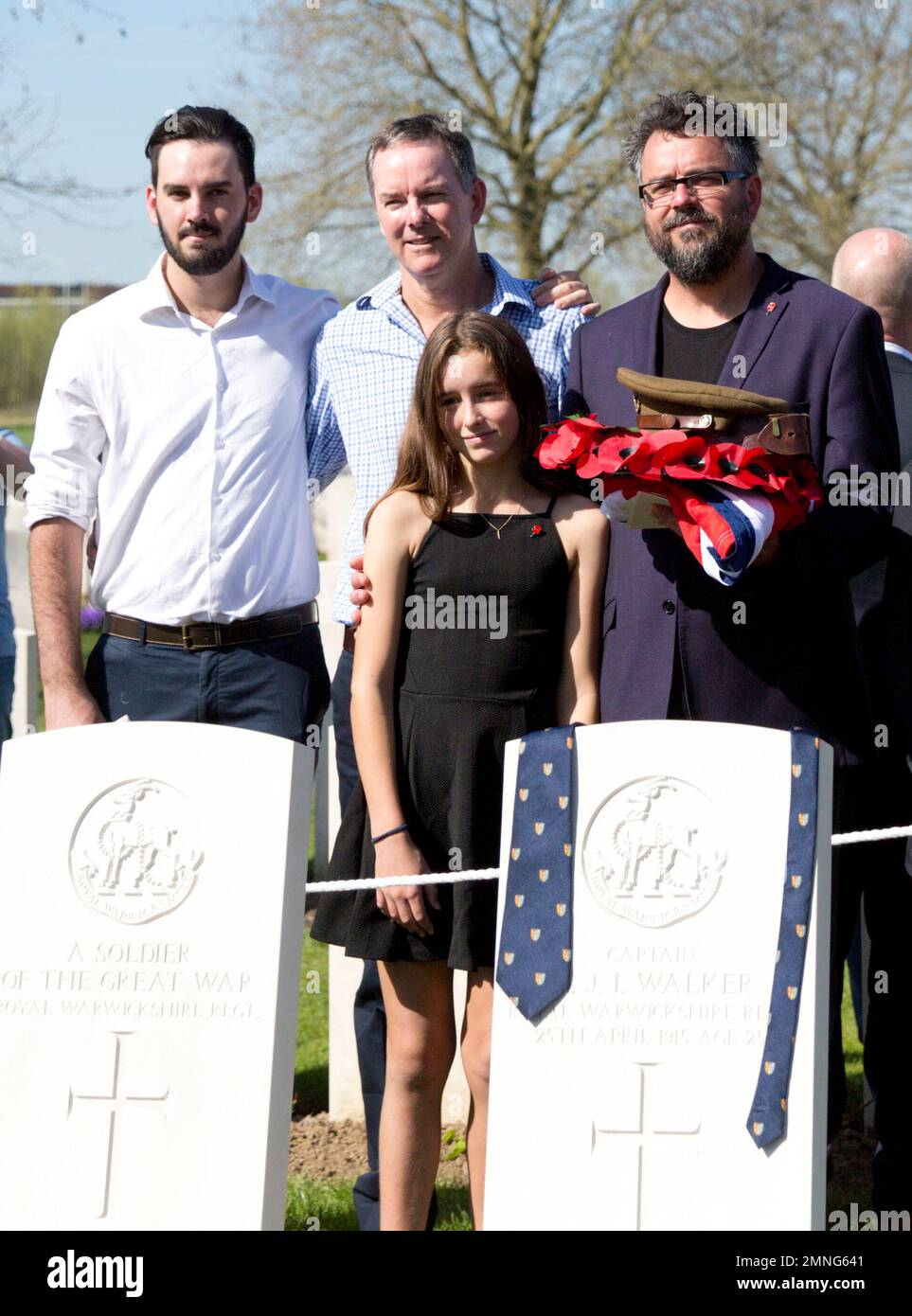 Family members Alistair Innes-Walker, center rear, and Allan Innes ...