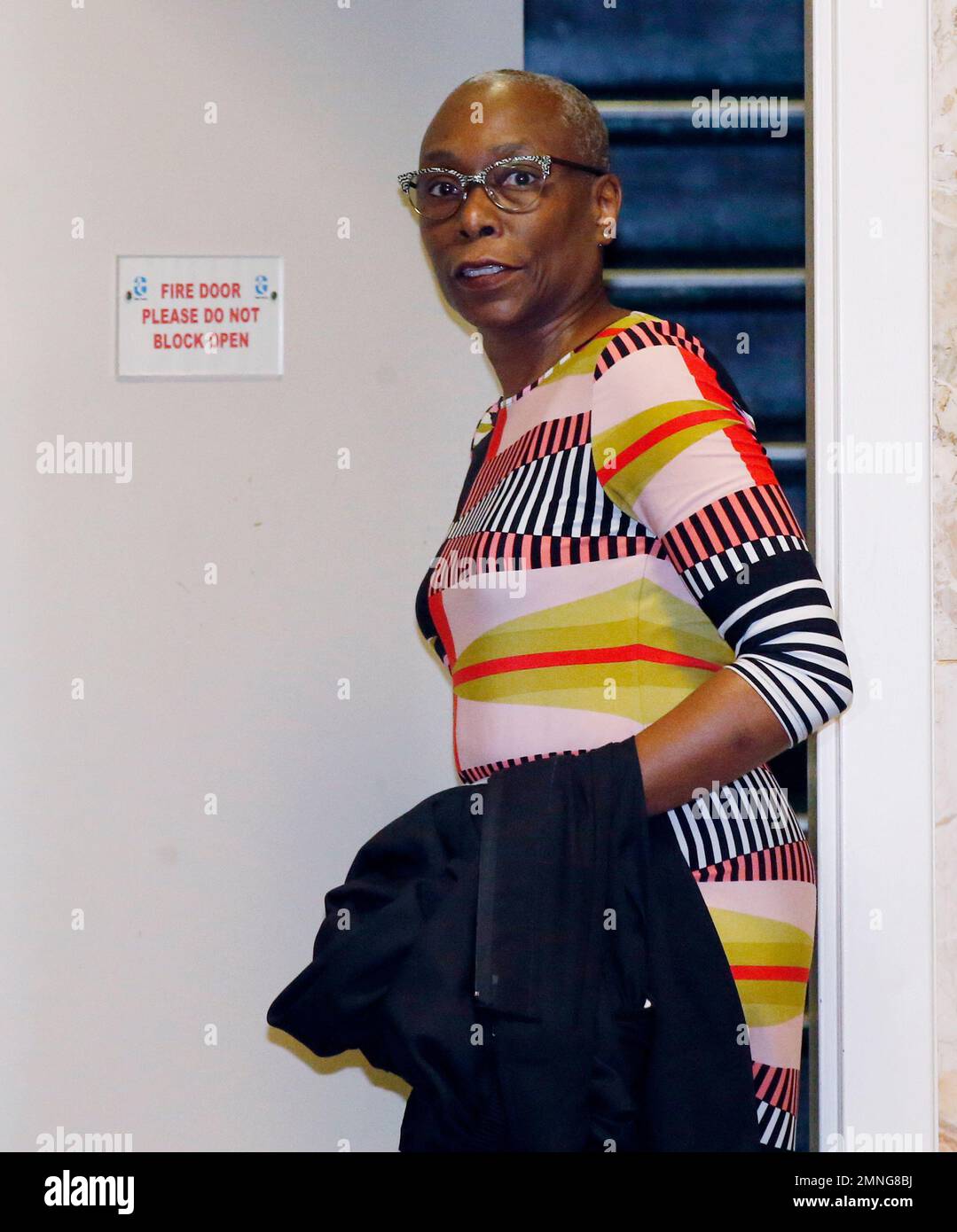 Tulsa County District Judge Sharon Holmes walks in the courthouse in ...