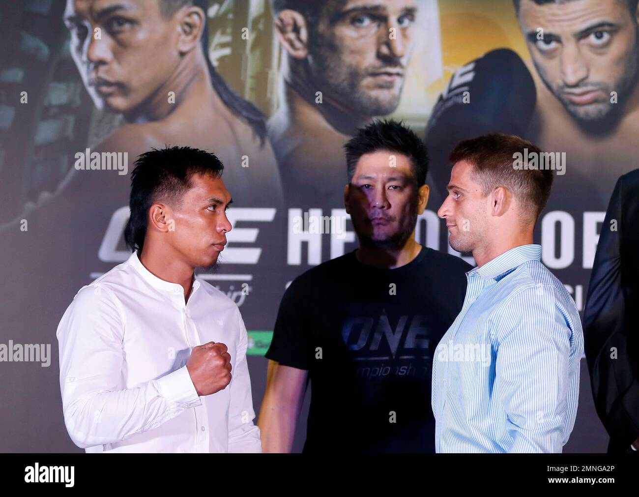 The Philippines' Kevin Belingon, left, and American Andrew Leone of ...