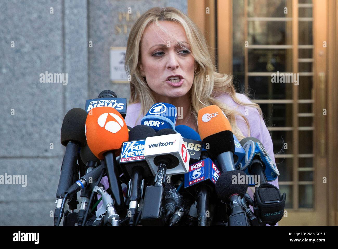 Adult film actress Stormy Daniels speaks outside federal court, Monday ...