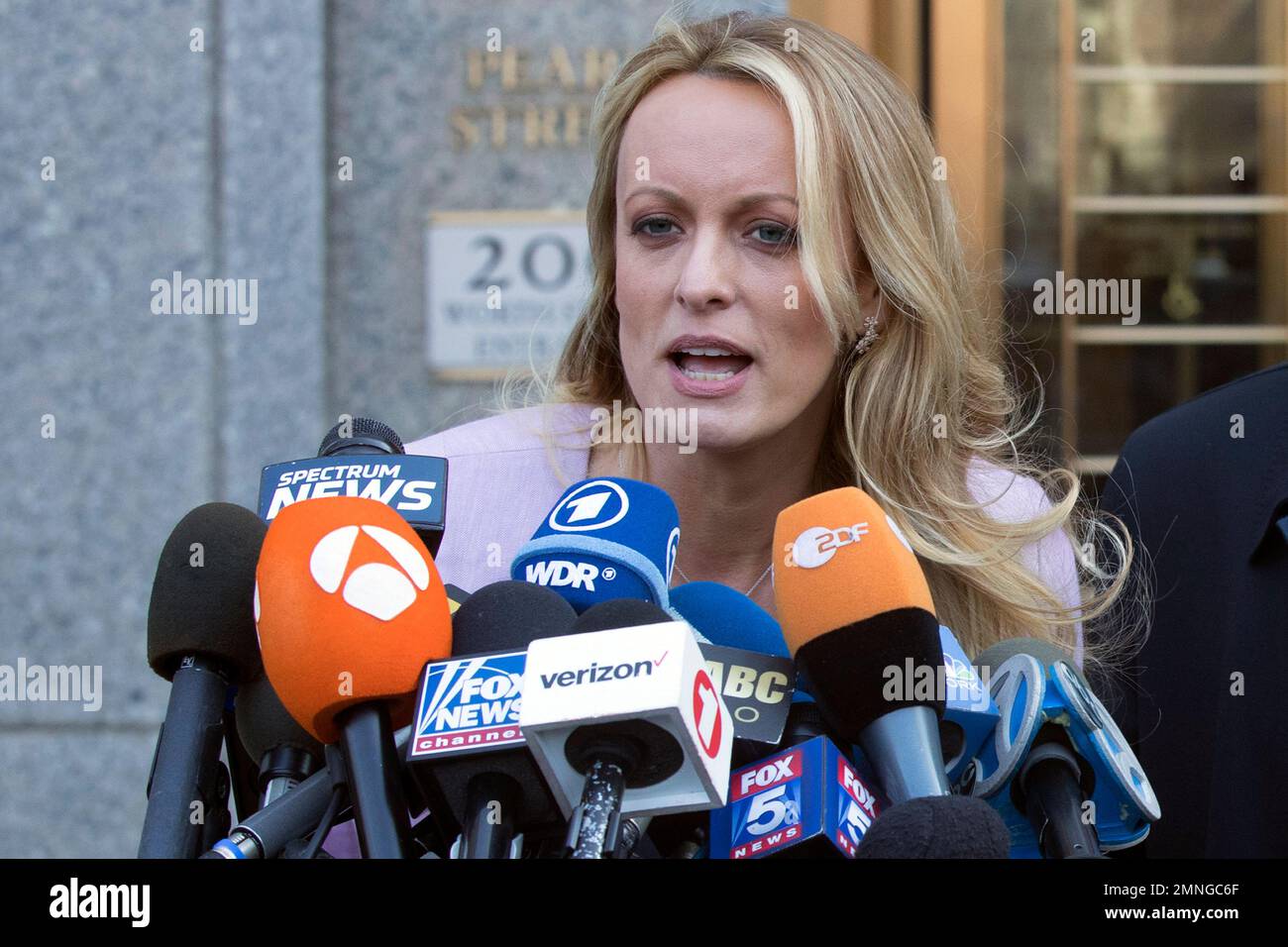 Adult film actress Stormy Daniels speaks outside federal court, Monday ...