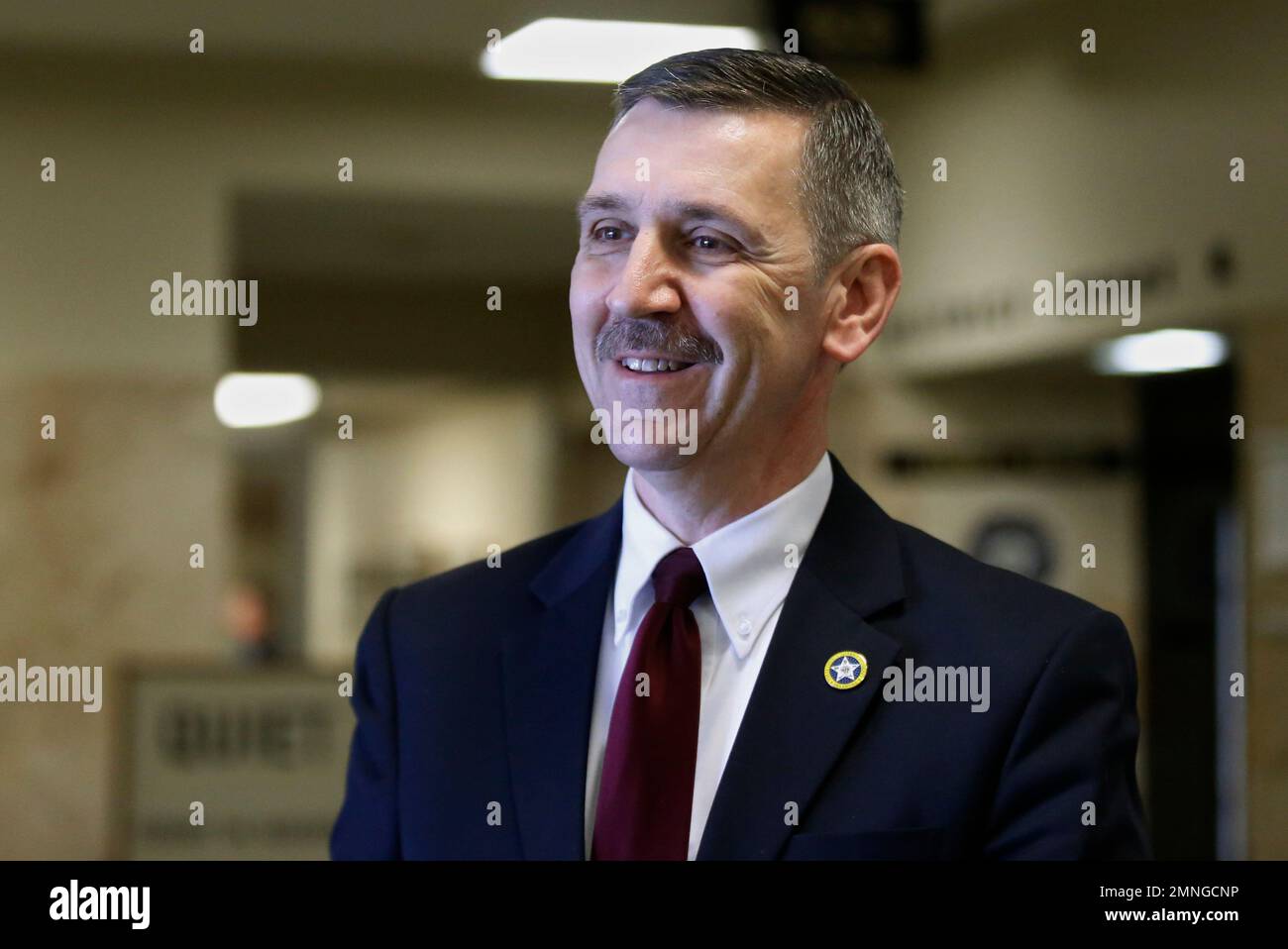 Tulsa County District Attorney Steve Kunzweiler walks from the ...