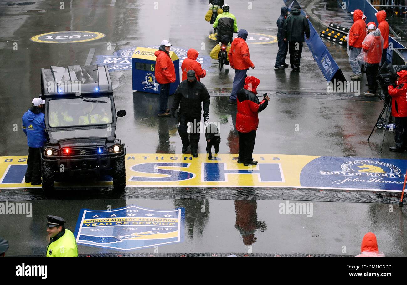 A Boston Special Operations K-9 police officer and his dog patrol the ...
