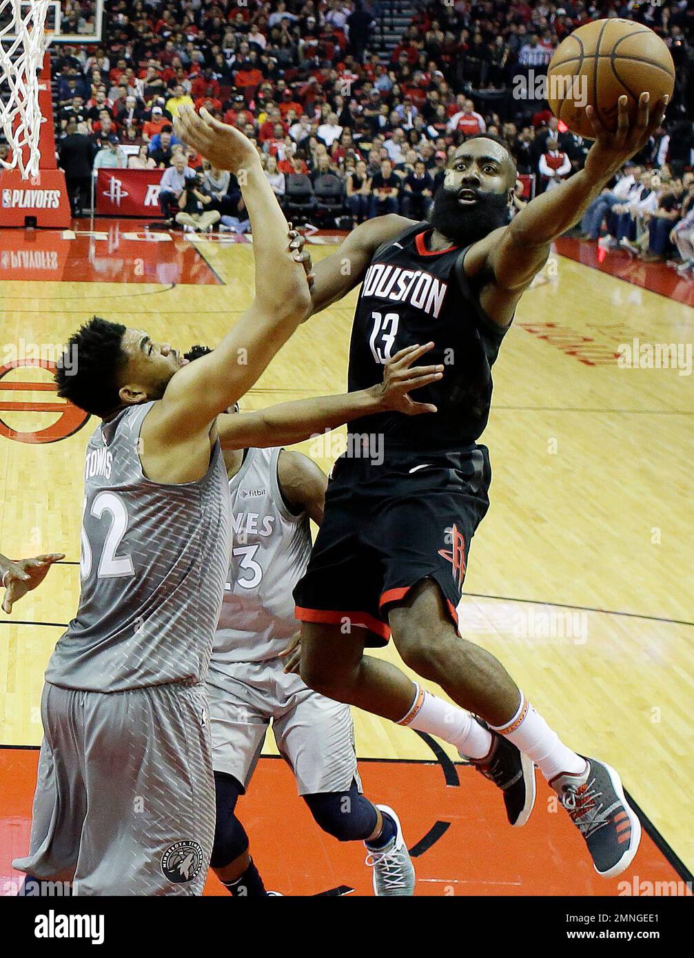 Houston Rockets' James Harden shoots over Minnesota Timberwolves' Karl ...