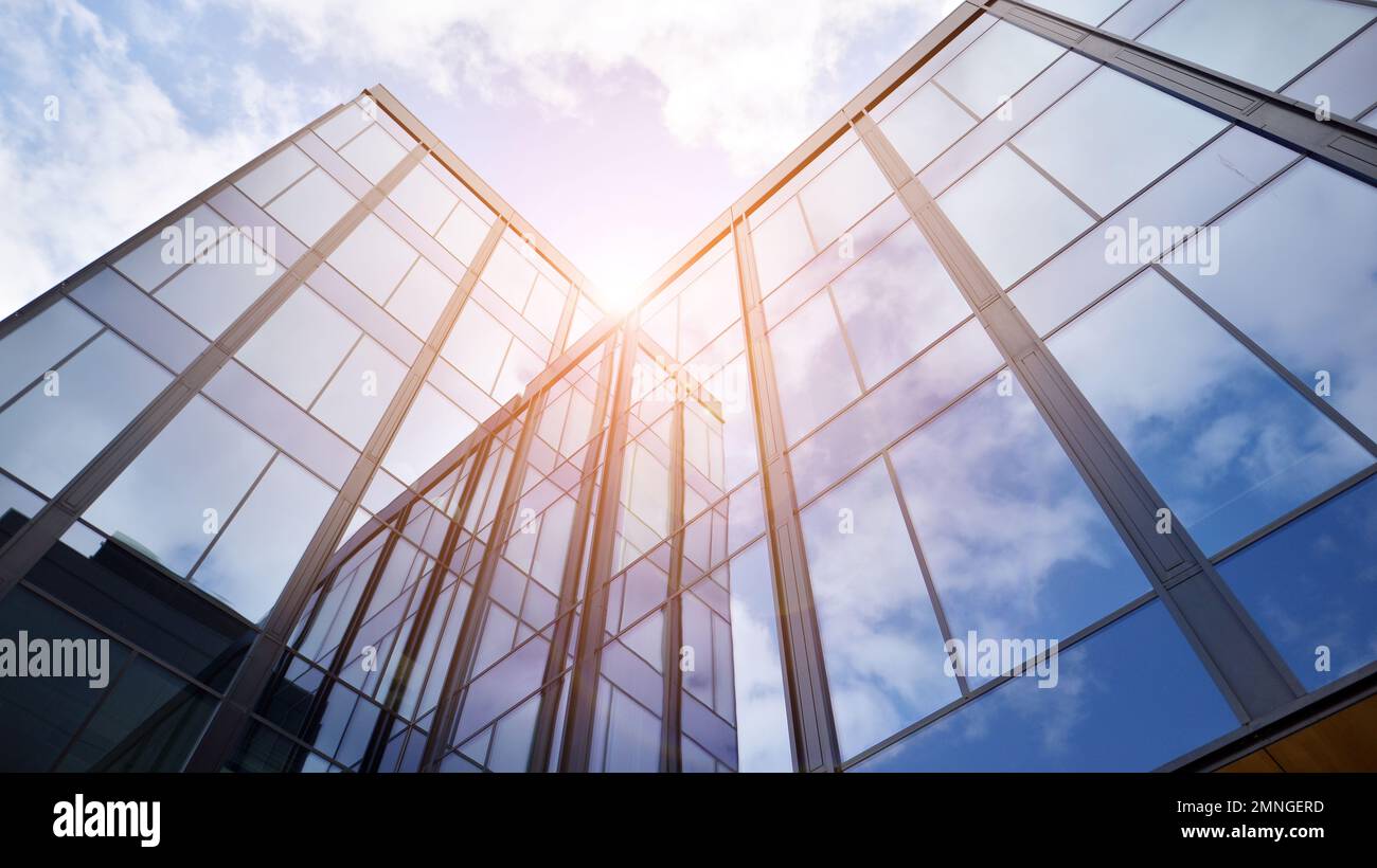 Abstract closeup of the glass-clad facade of a modern building covered ...