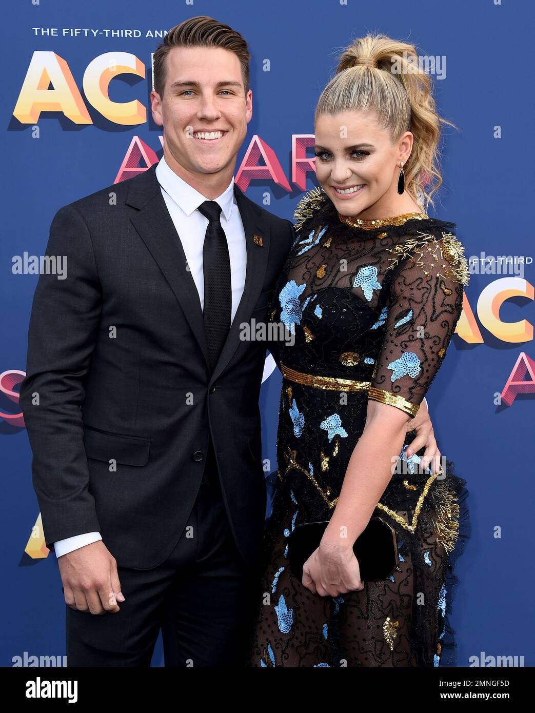 Alex Hopkins, left, and Lauren Alaina arrive at the 53rd annual Academy ...