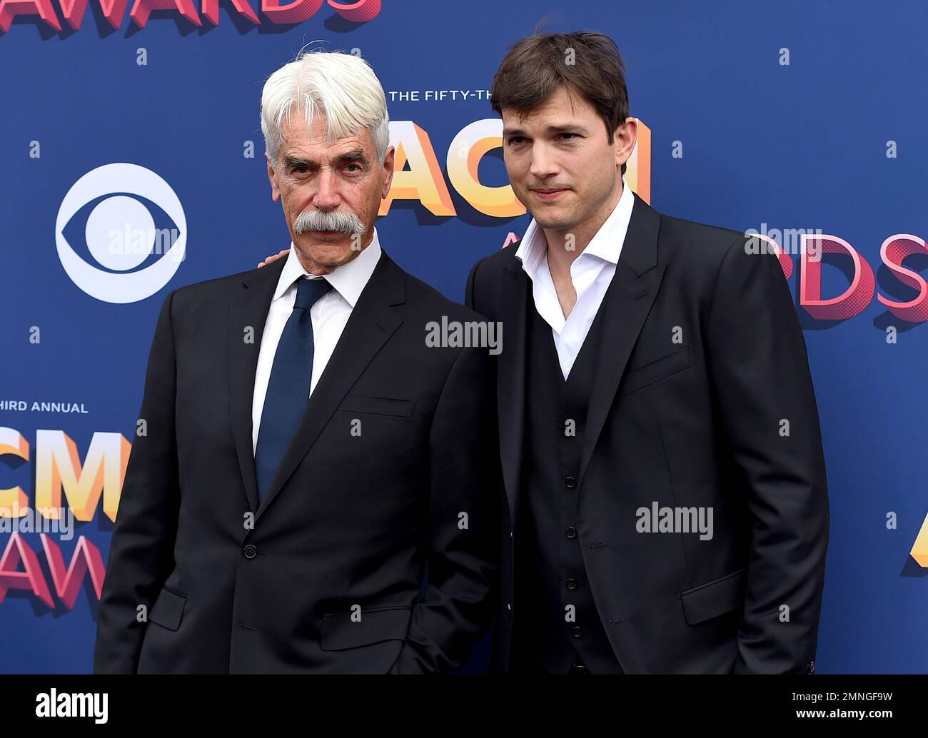 Sam Elliott, left, and Ashton Kutcher arrive at the 53rd annual Academy ...