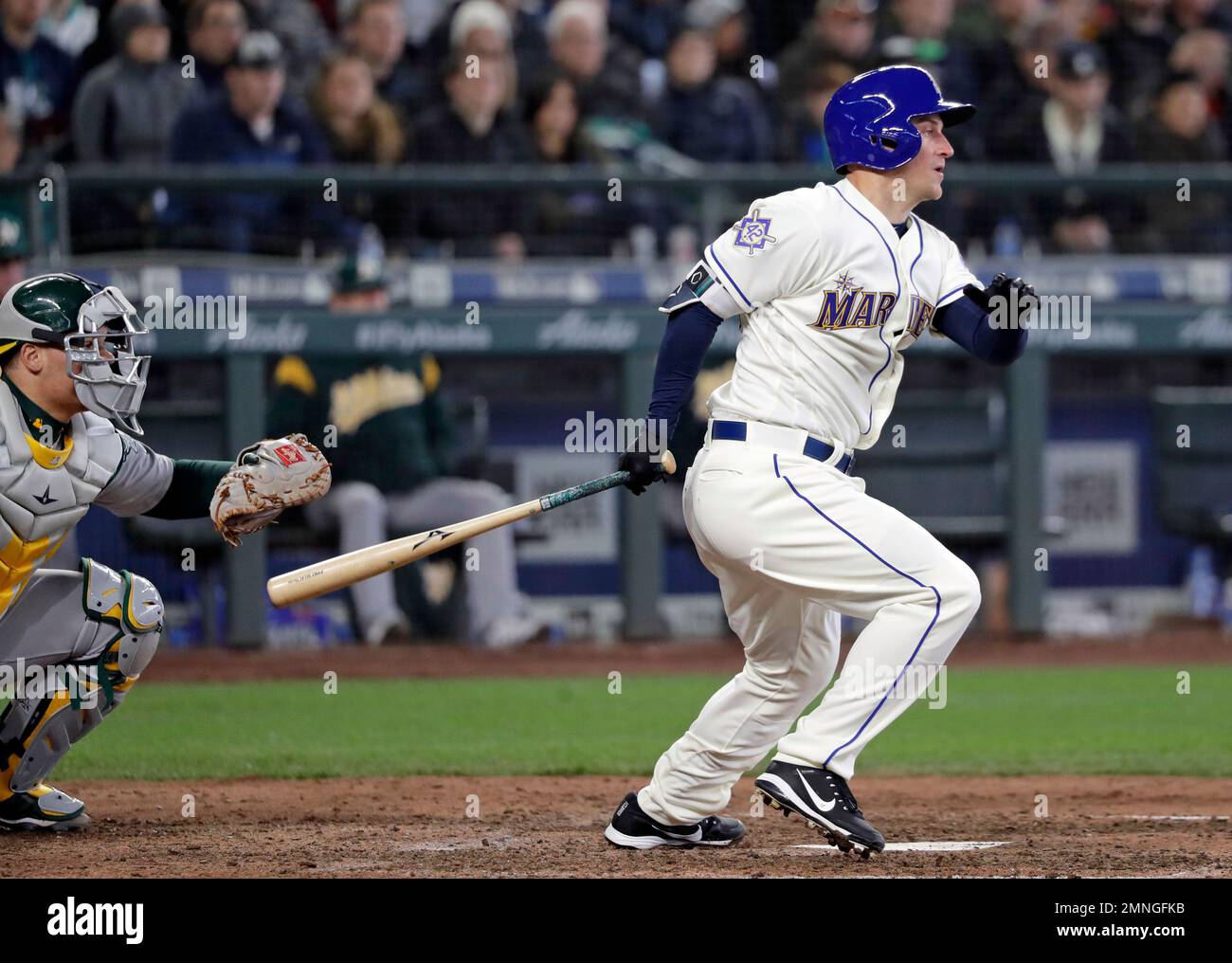 Seattle Mariners' Kyle Seager, right, grounds out to end a baseball ...