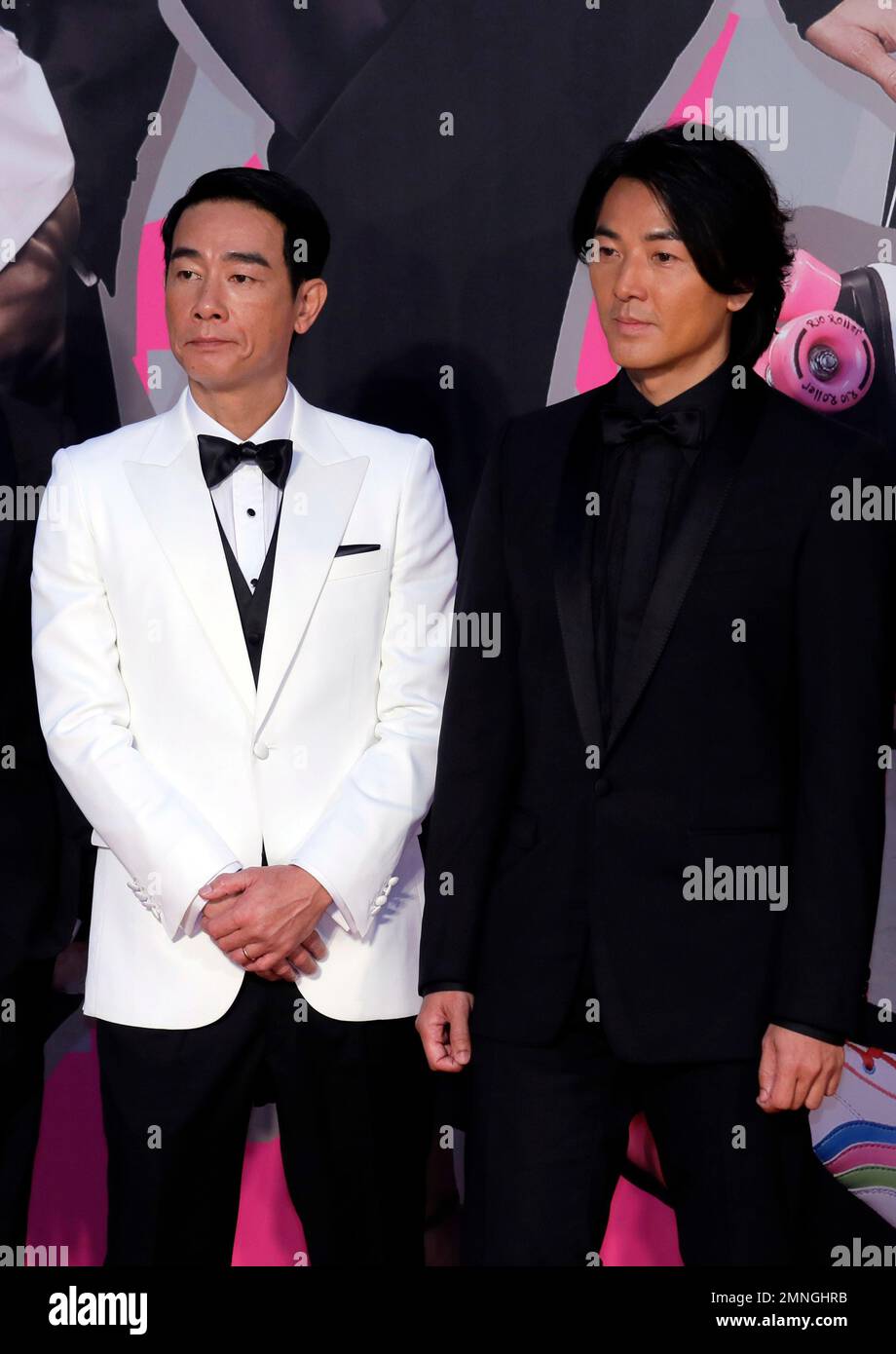 Hong Kong actors Jordan Chan, left, and Ekin Cheng pose on the red ...