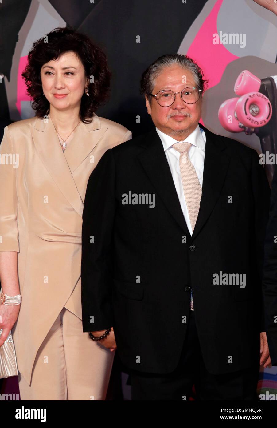 Hong Kong actor-director Sammo Hung, and his wife Joyce Godenzi pose on ...