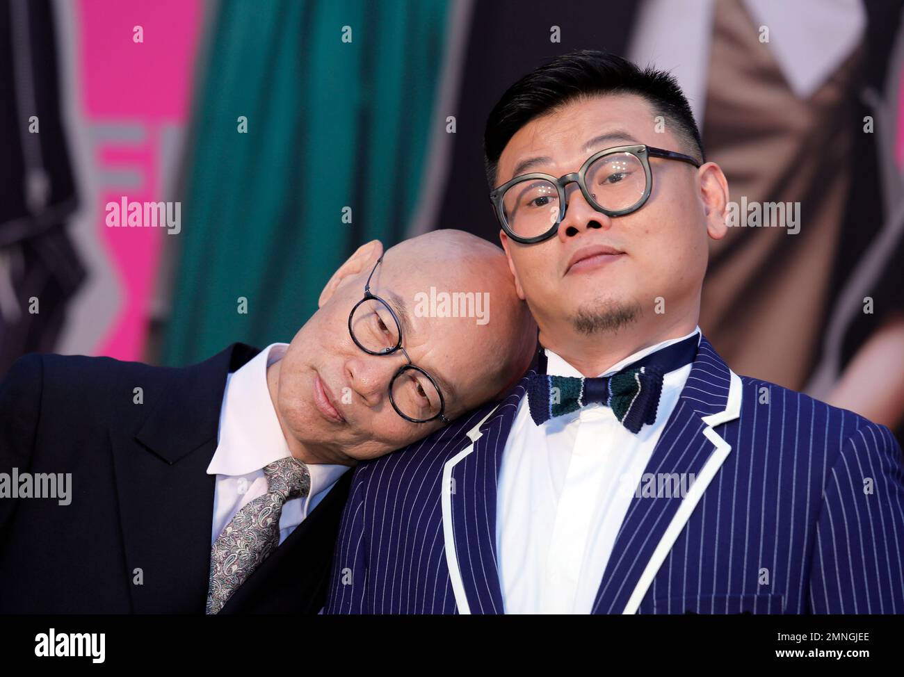 Hong Kong actors Law Kar-ying, left, and Michael Ning pose on the red carpet of the Hong Kong ...