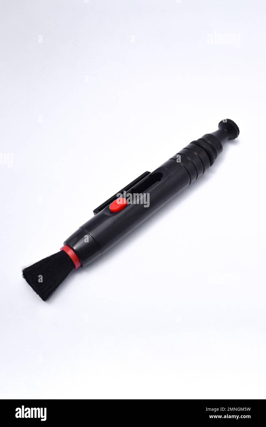 black and red lens pen, closeup and isolated on white background ...