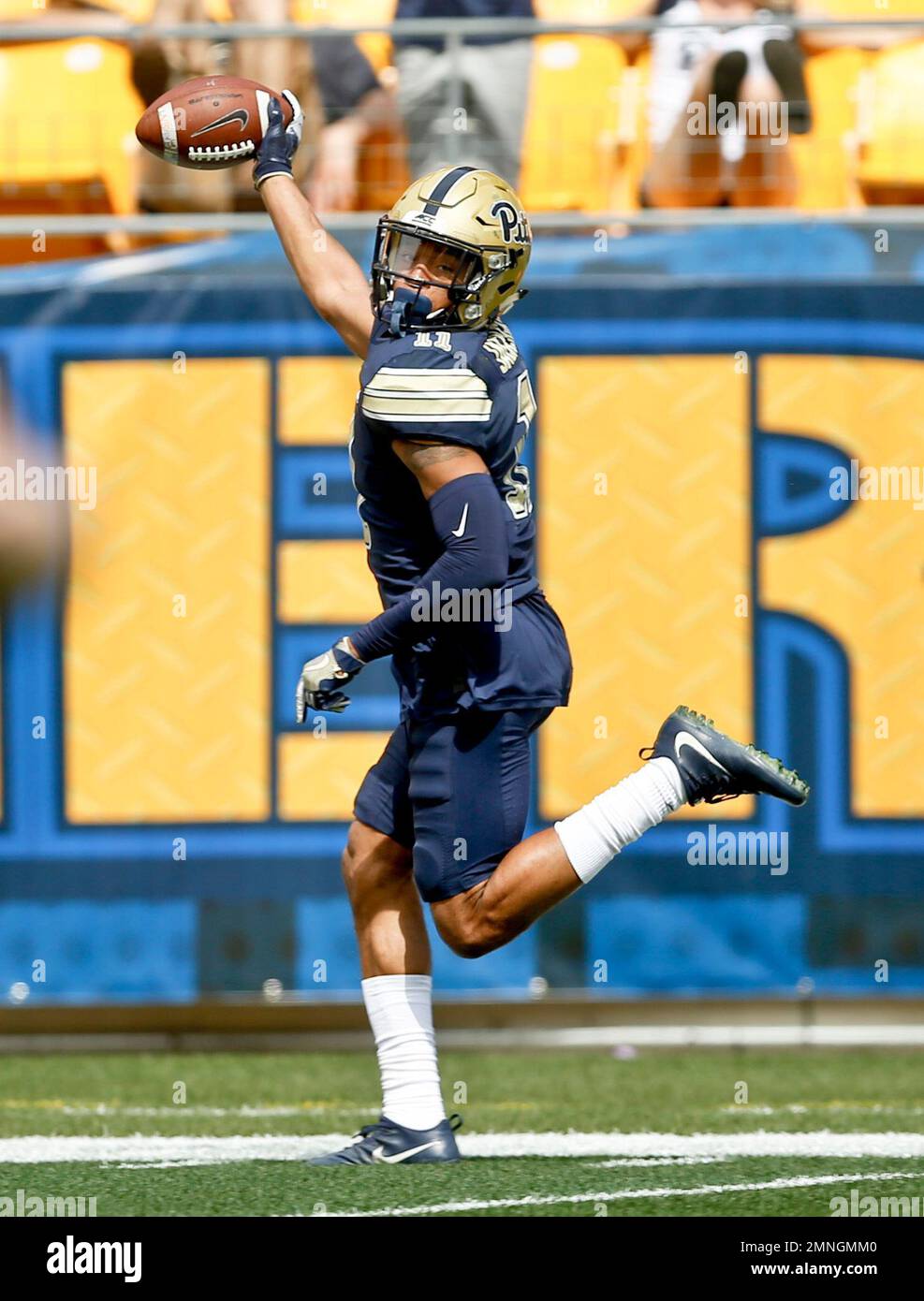 Pittsburgh defensive back Dane Jackson (11) returns an interception for ...