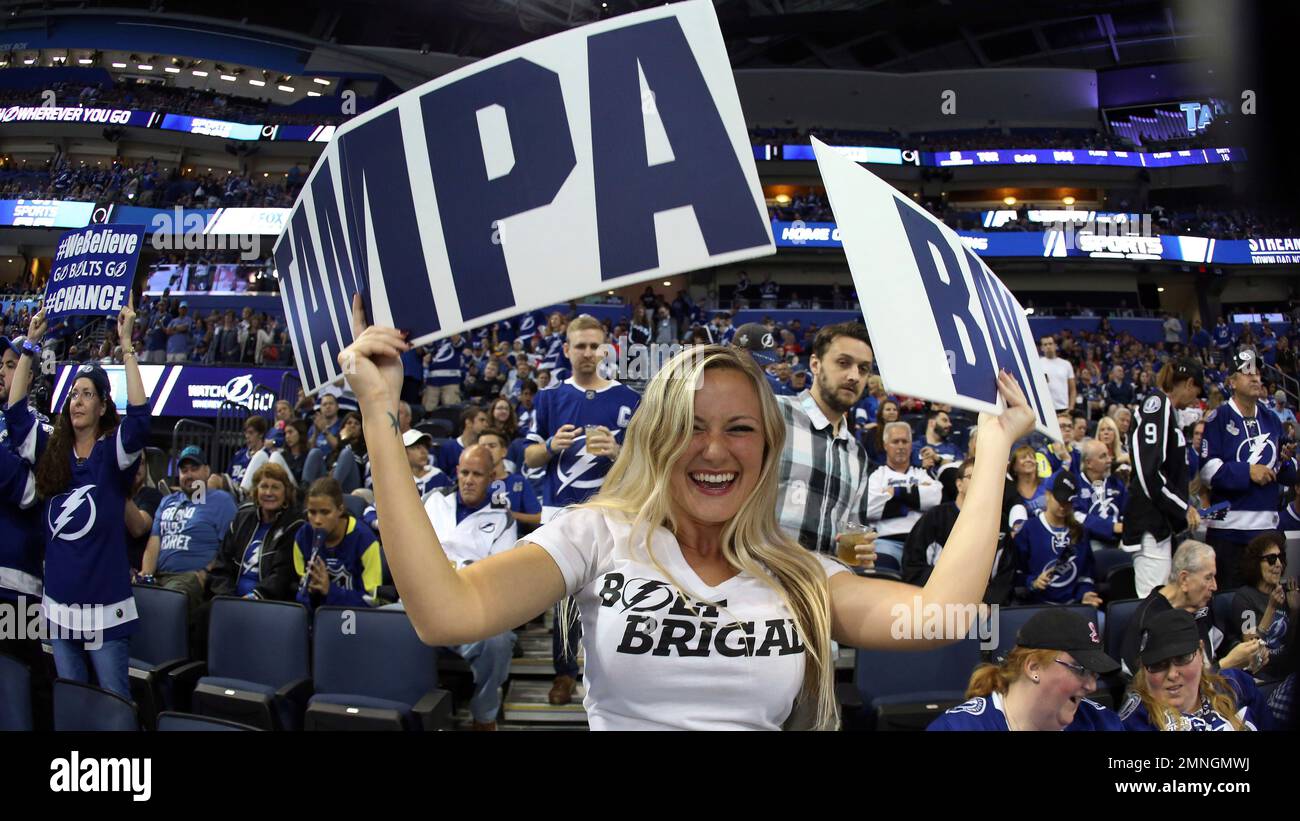 A member of the Tampa Bay Lightning Bolt Brigade fires up the fans ...
