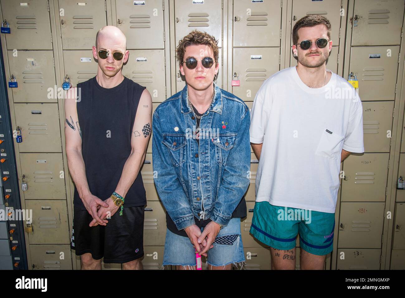 Les Priest, from left, Paul Klein and Jake Goss of LANY poses at ...