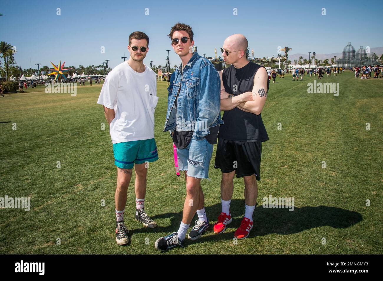 Jake Goss, from left, Paul Klein and Les Priest of LANY poses at ...
