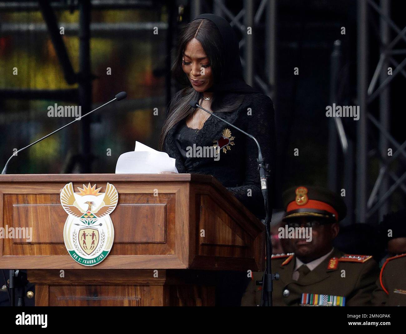 British model Naomi Campbell is overcome with emotion as she pays a tribute to anti-apartheid ...