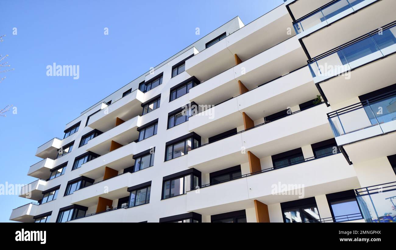 Futuristic square architecture of apartment building. Real estate with ...