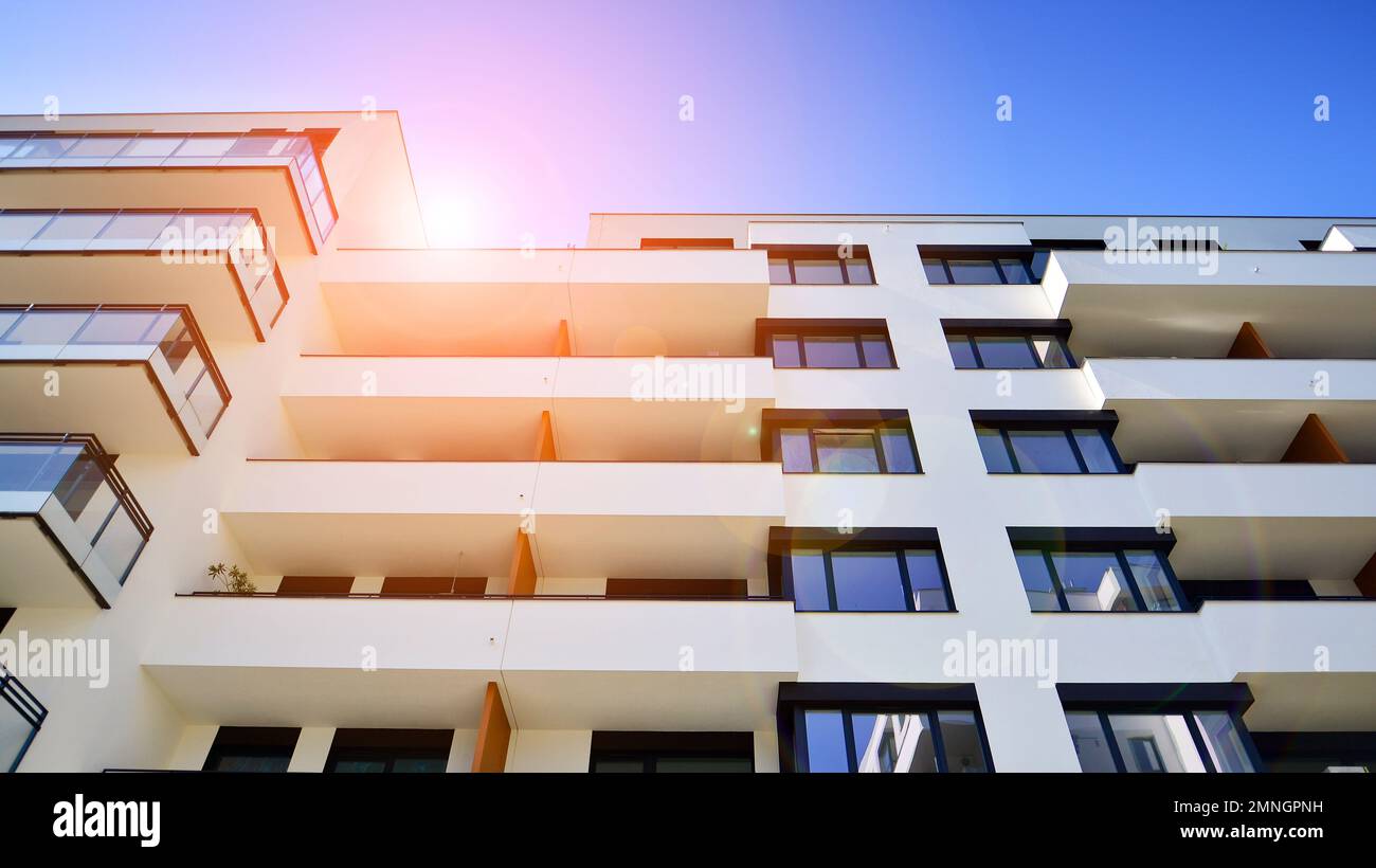 Futuristic square architecture of apartment building. Real estate with ...