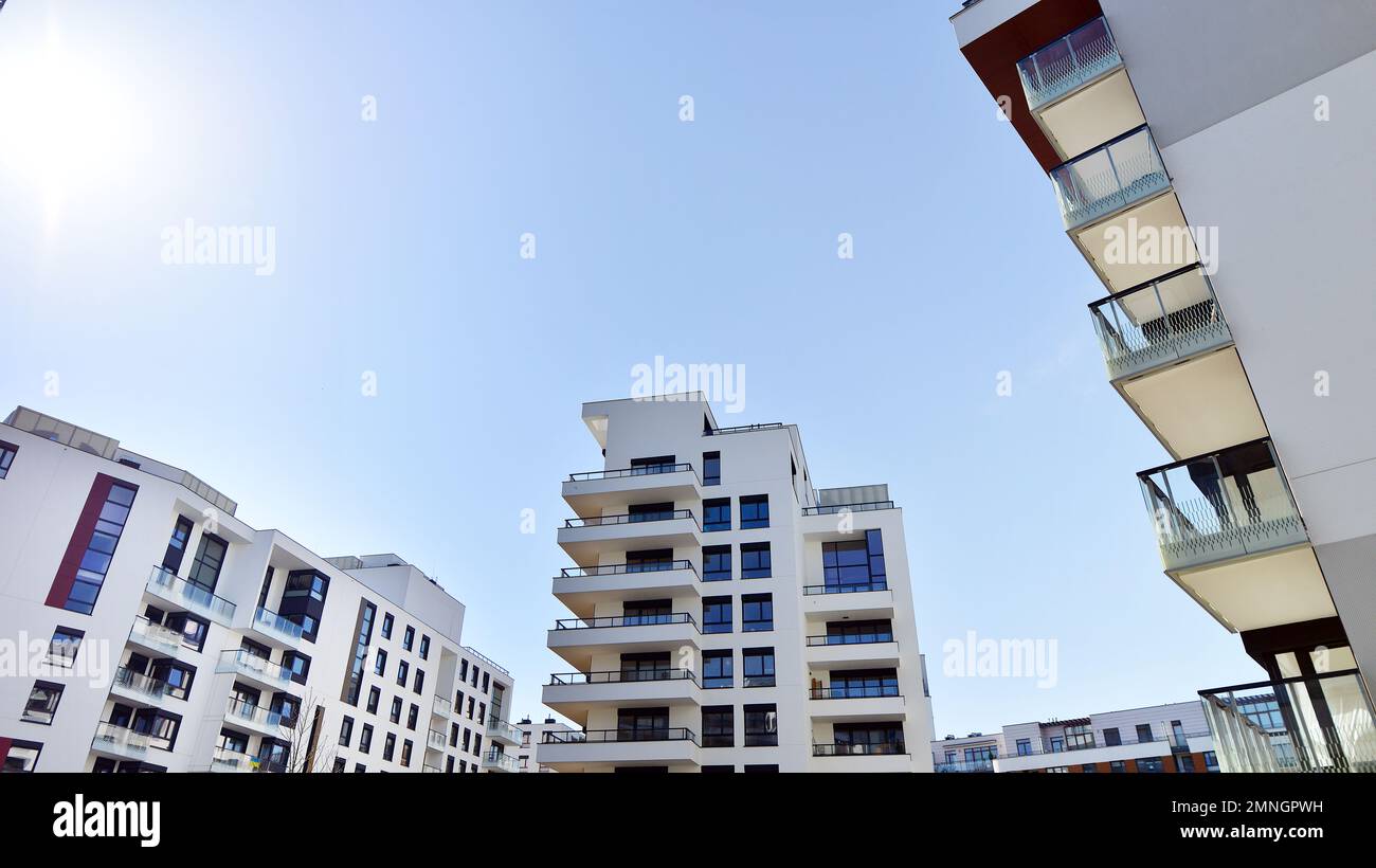 Futuristic square architecture of apartment building. Real estate with ...