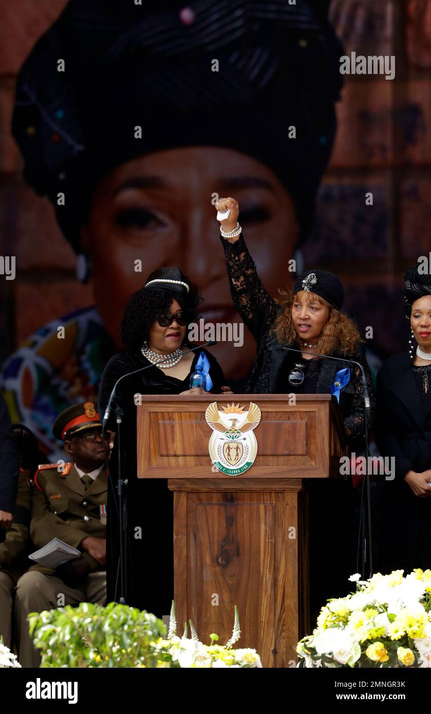 Sisters Zindzi, left, and Zenani, right, at podium, appear on stage to ...