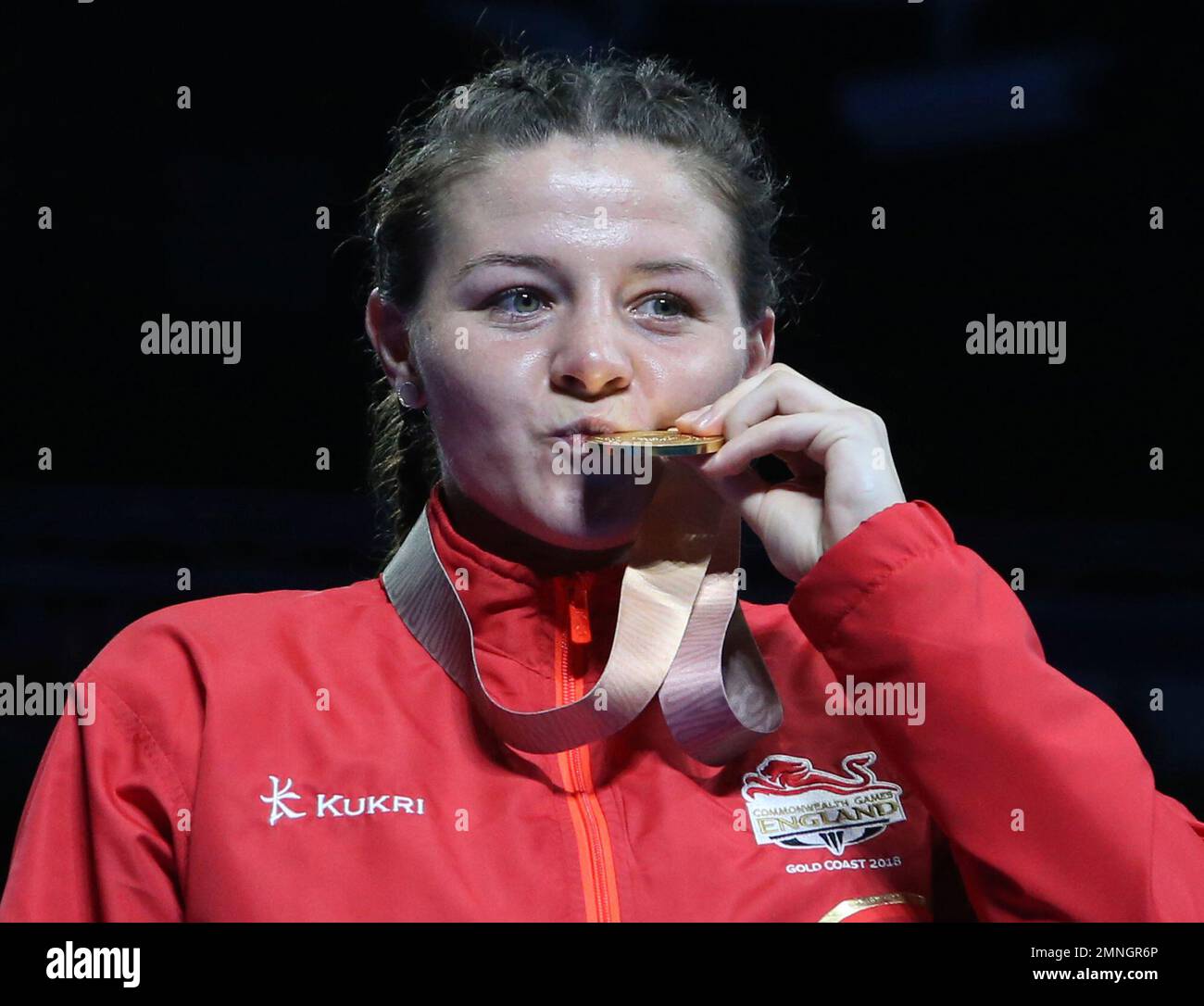 Sandy Ryan of England kisses her gold medal during the medal ceremony ...